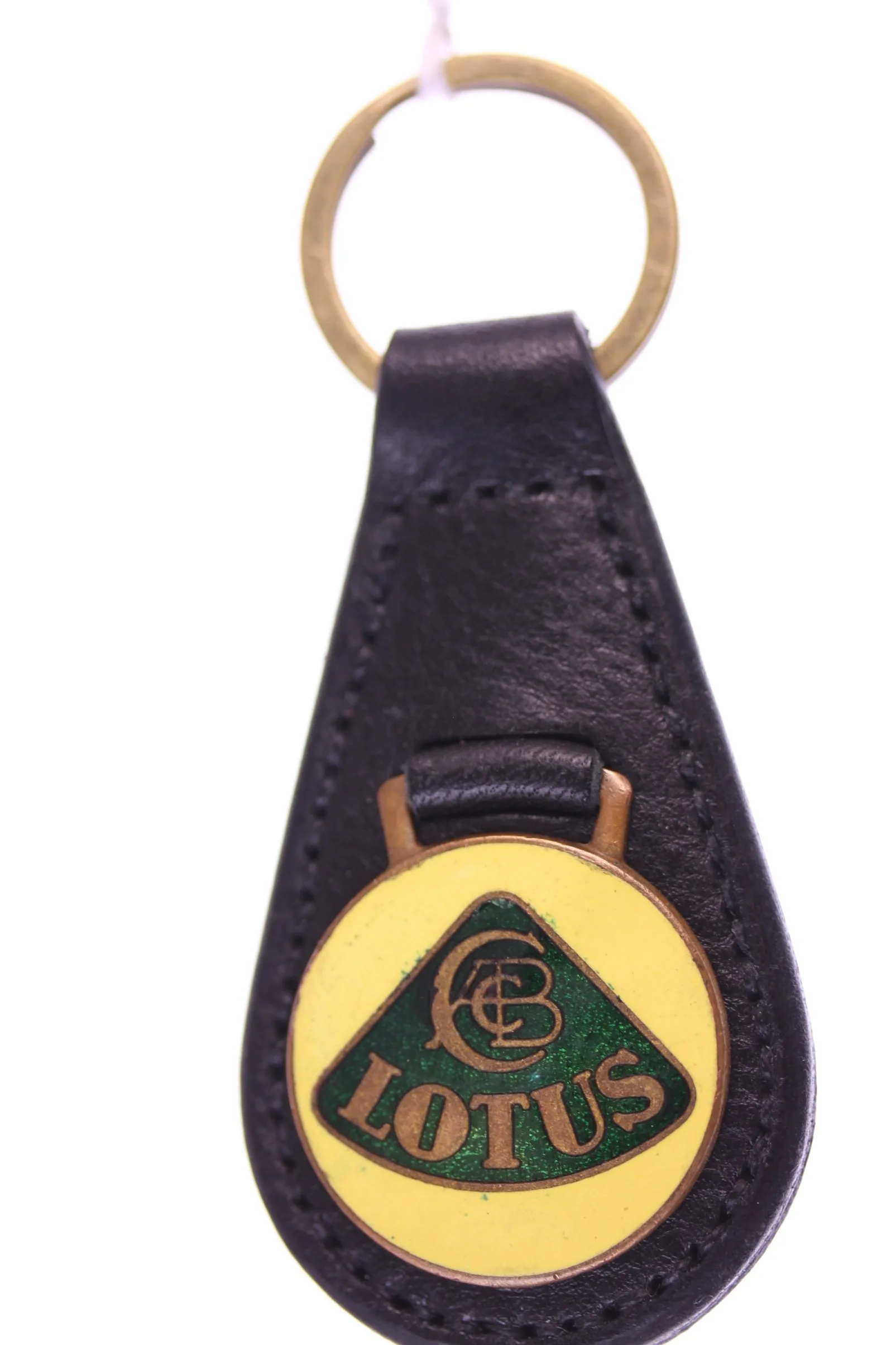 Lotus – original 1960s vitreous enamel on gilt badge remounted onto a ...