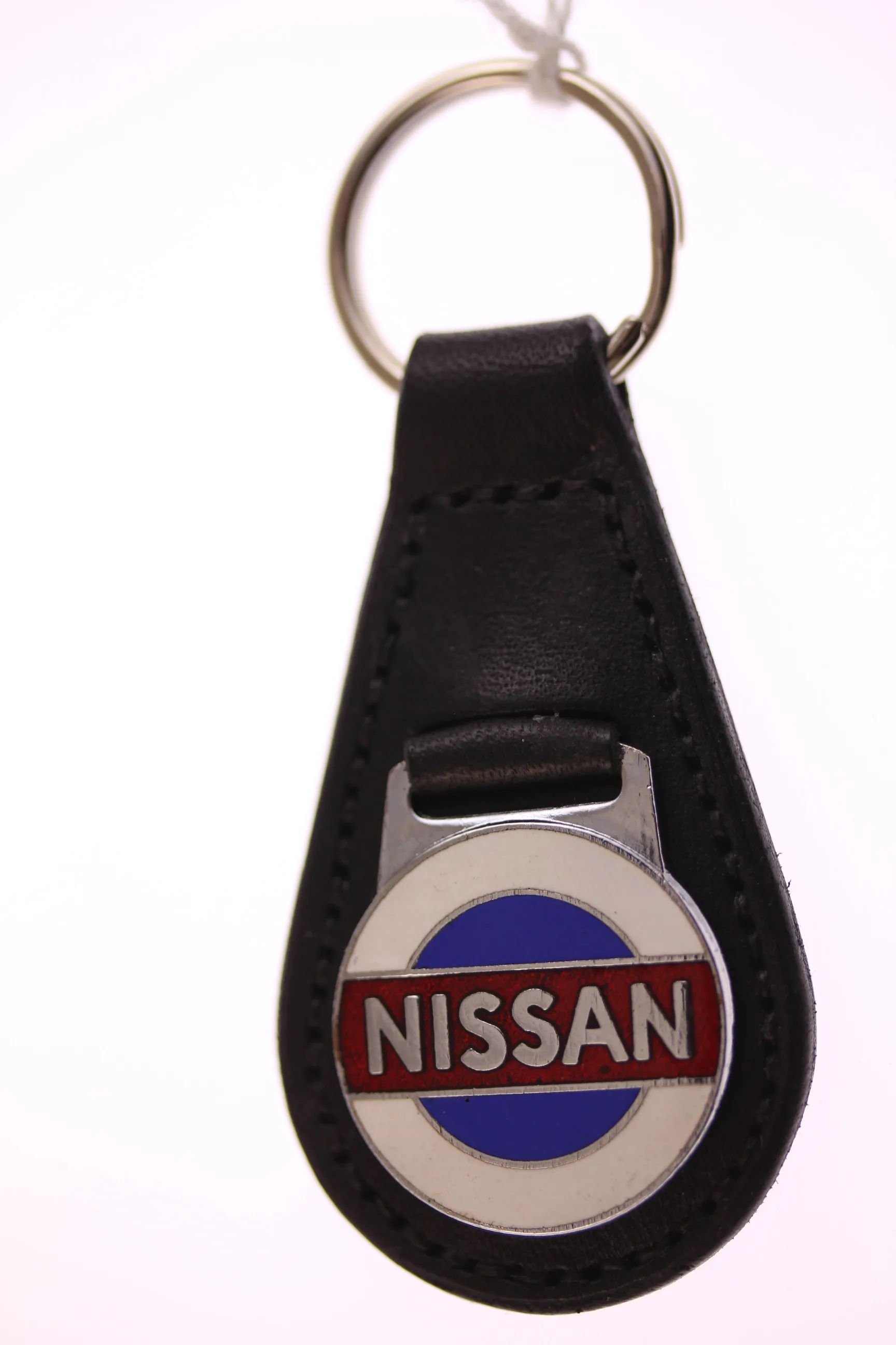Nissan - original 1980s? vitreous enamel keyfob badge remounted onto a ...